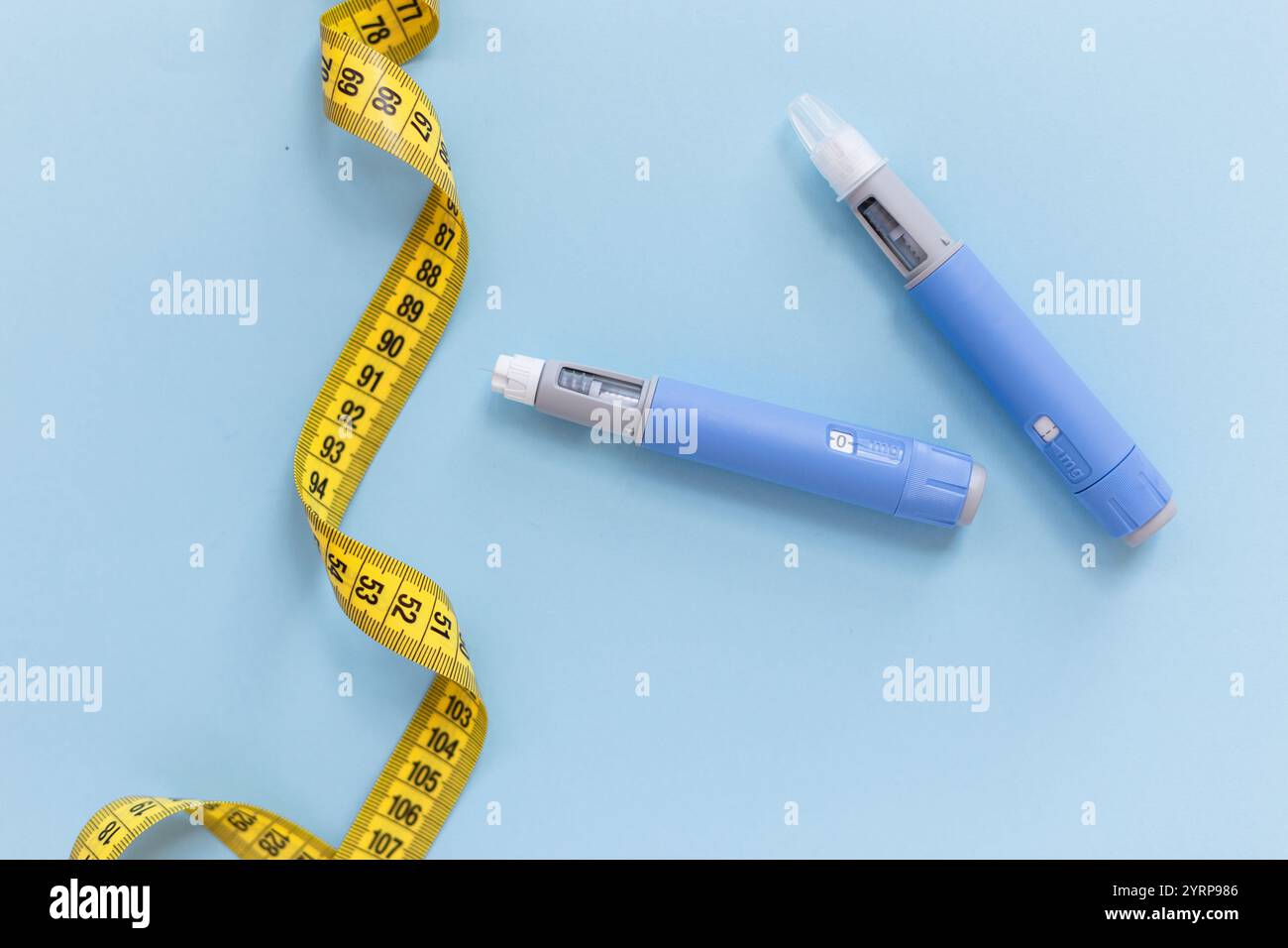 Two drugs injection ozempic for weight loss with a measuring yellow ...