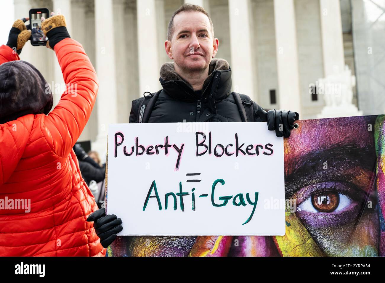 Washington, United States. 04th Dec, 2024. A person holding a sign ...