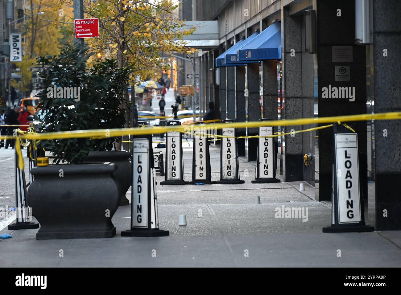 Midtown Manhattan, United States. 04th Dec, 2024. Police yellow tape ...