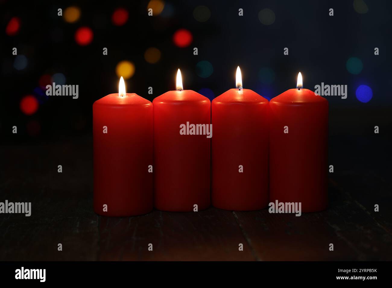 Advent Season, four candles burning. Advent background Stock Photo - Alamy