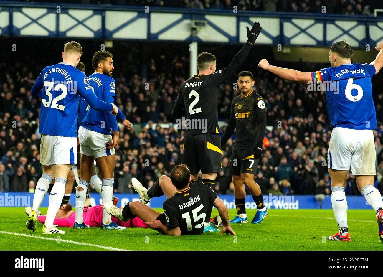 Wolverhampton Wanderers' Craig Dawson (centre bottom) scores Everton's ...