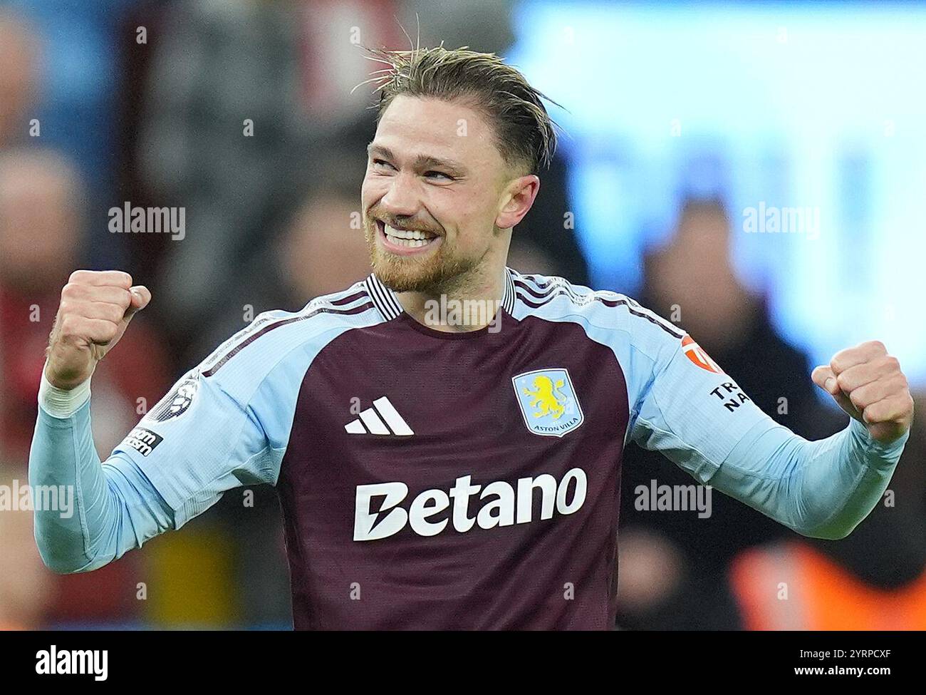 Aston Villa's Matty Cash celebrates scoring their side's third goal of ...