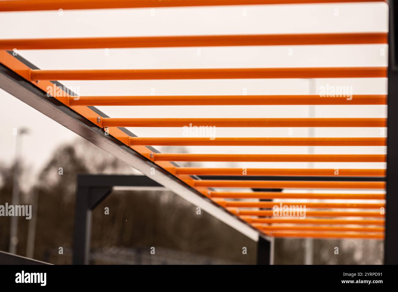 Orange monkey bars at an obstacle course Stock Photo - Alamy