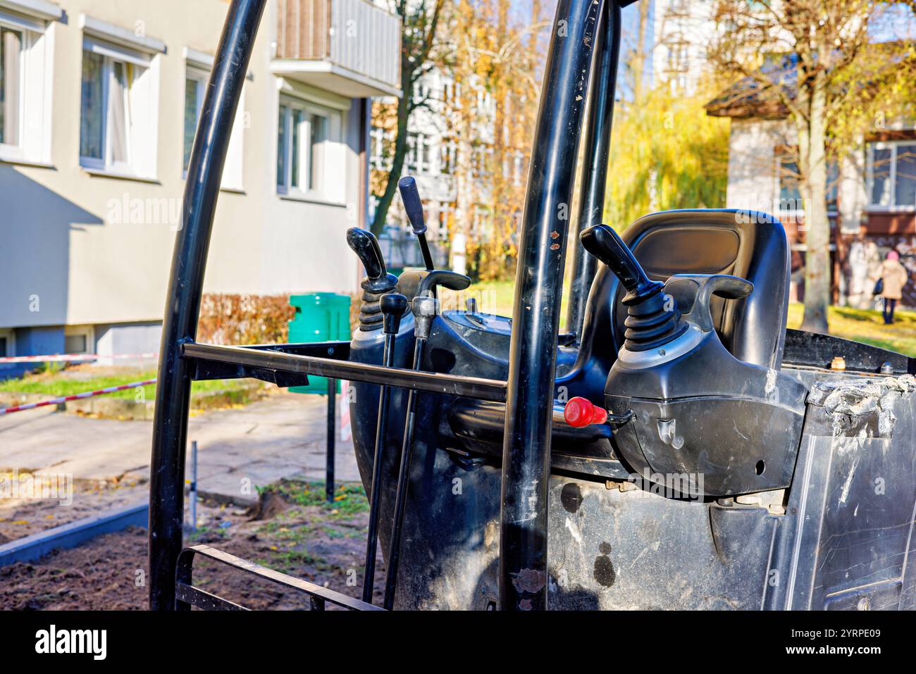 Control levers of a mini excavator in an open cab Stock Photo - Alamy