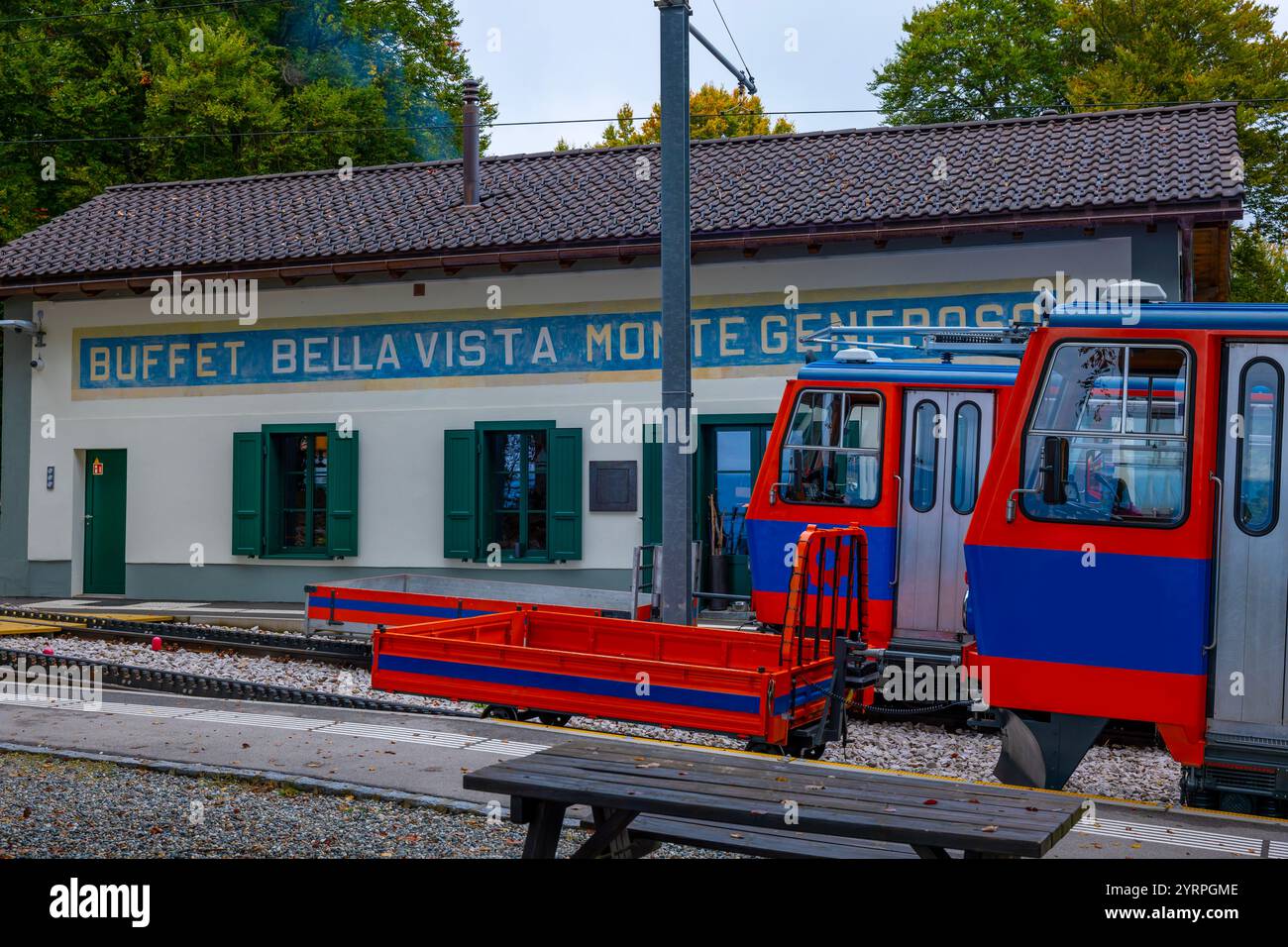 Mountain Train on Railroad Station with Tracks and Restaurant Bella ...