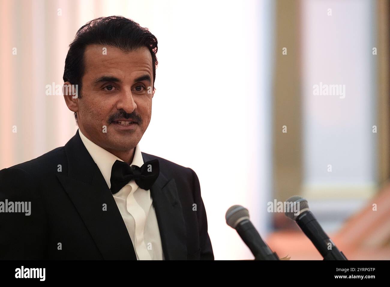 The Emir of Qatar Sheikh Tamim bin Hamad Al Thani speaking at a dinner ...