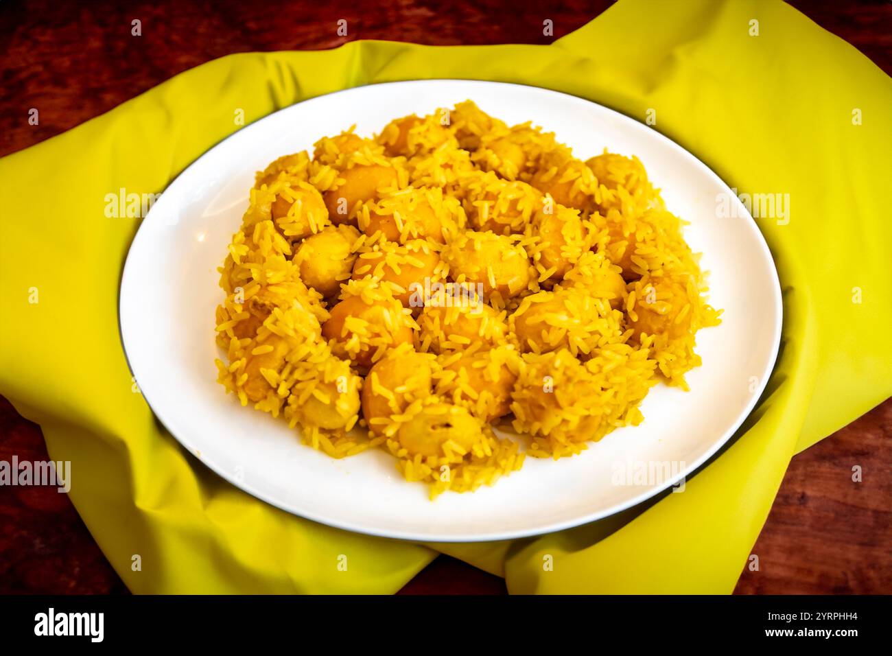 Traditional Brazilian dish chicken with pequi (caryocar brasiliense ...