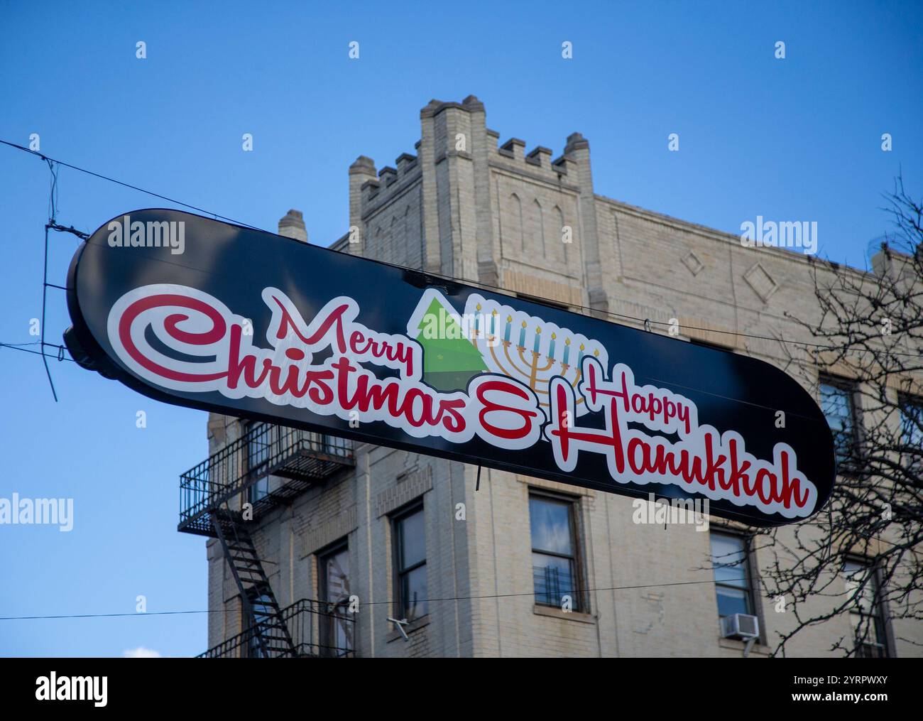 Merry Christmas and Happy Chanukah sign above Arthur Avenue in the ...