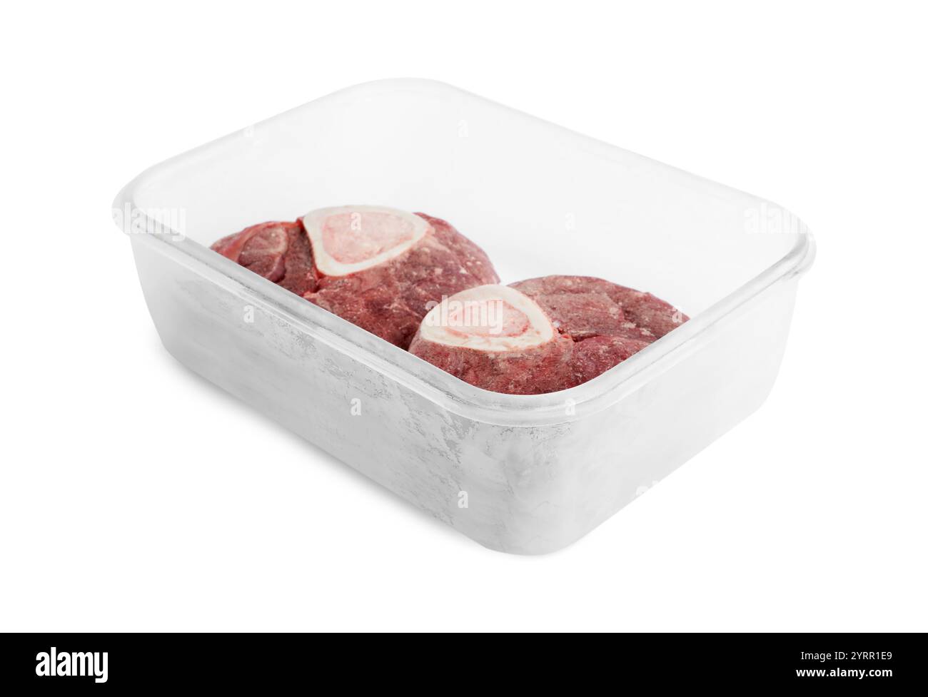 Frozen beef steaks in container isolated on white Stock Photo - Alamy