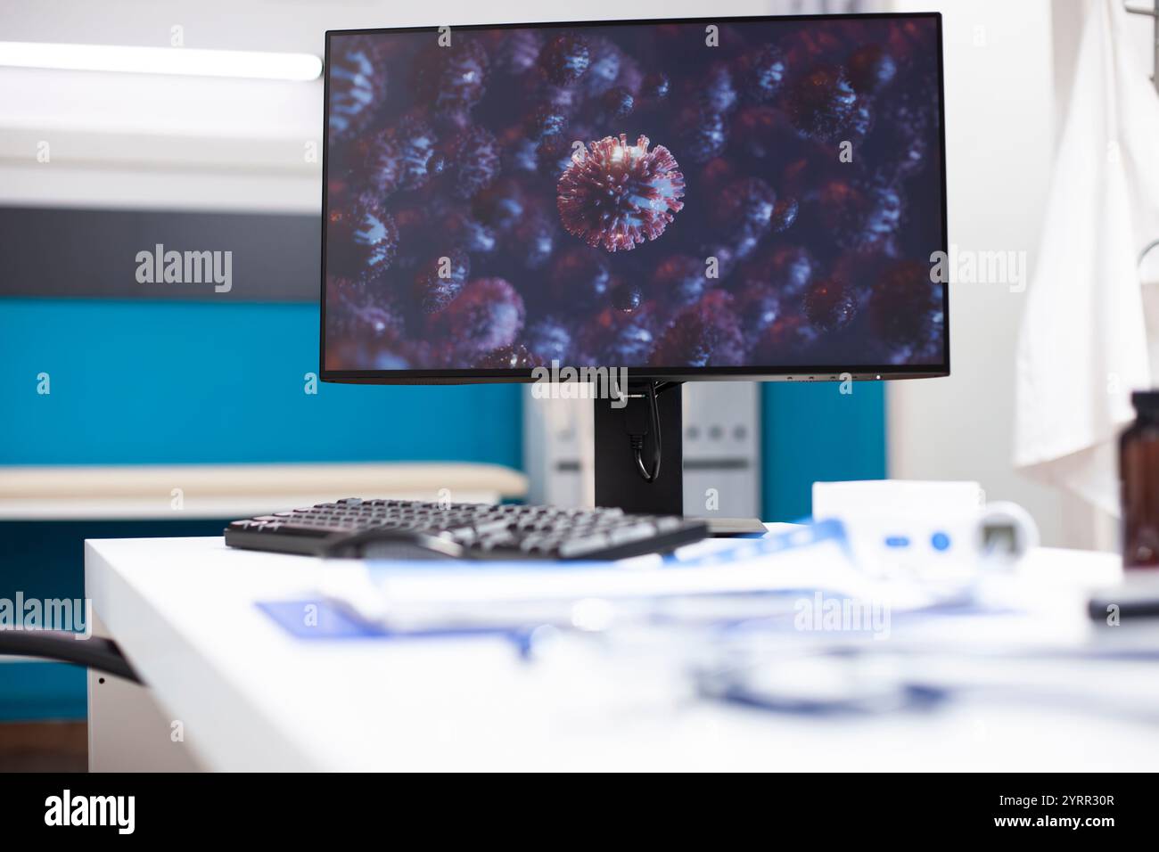 Closeup of computer monitor showing microscopic germs, emphasizing ...