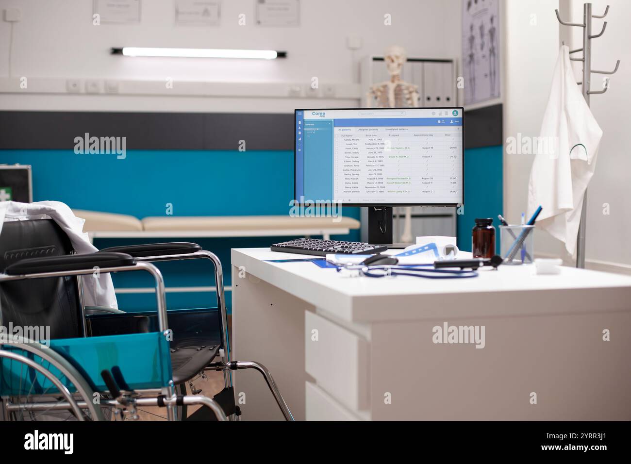 Computer monitor on vacant desk in a wheelchair accessible medical ...