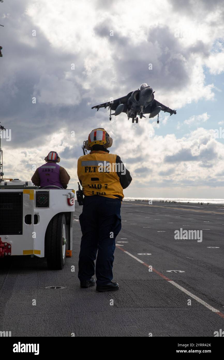 An AV-8B Harrier, assigned to Marine Attack Squadron (VMA) 223, lands ...