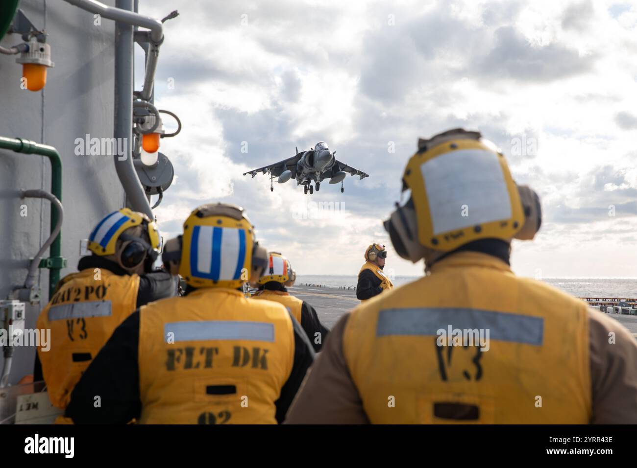 An AV-8B Harrier, assigned to Marine Attack Squadron (VMA) 223, lands ...
