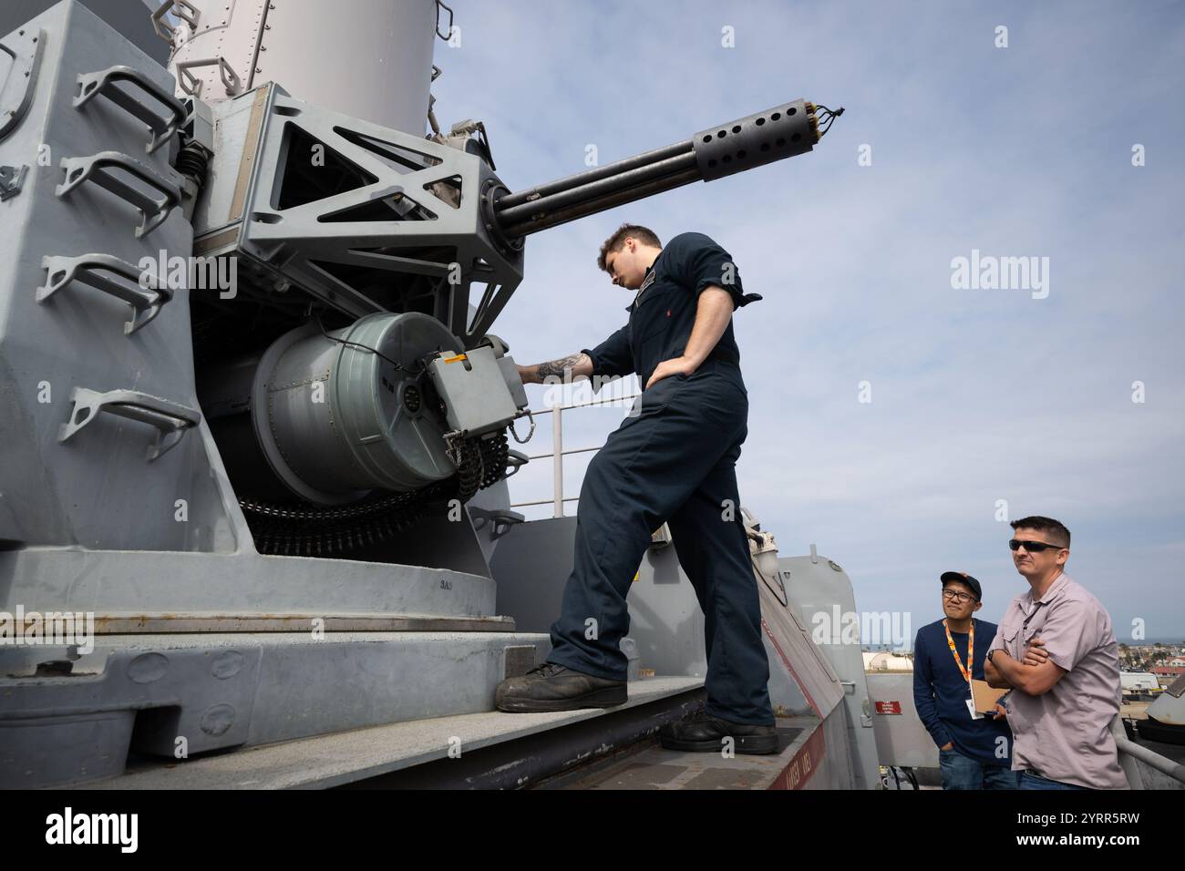 From left: USS Comstock (LSD 45) Fire Controlman Petty Officer 2nd ...