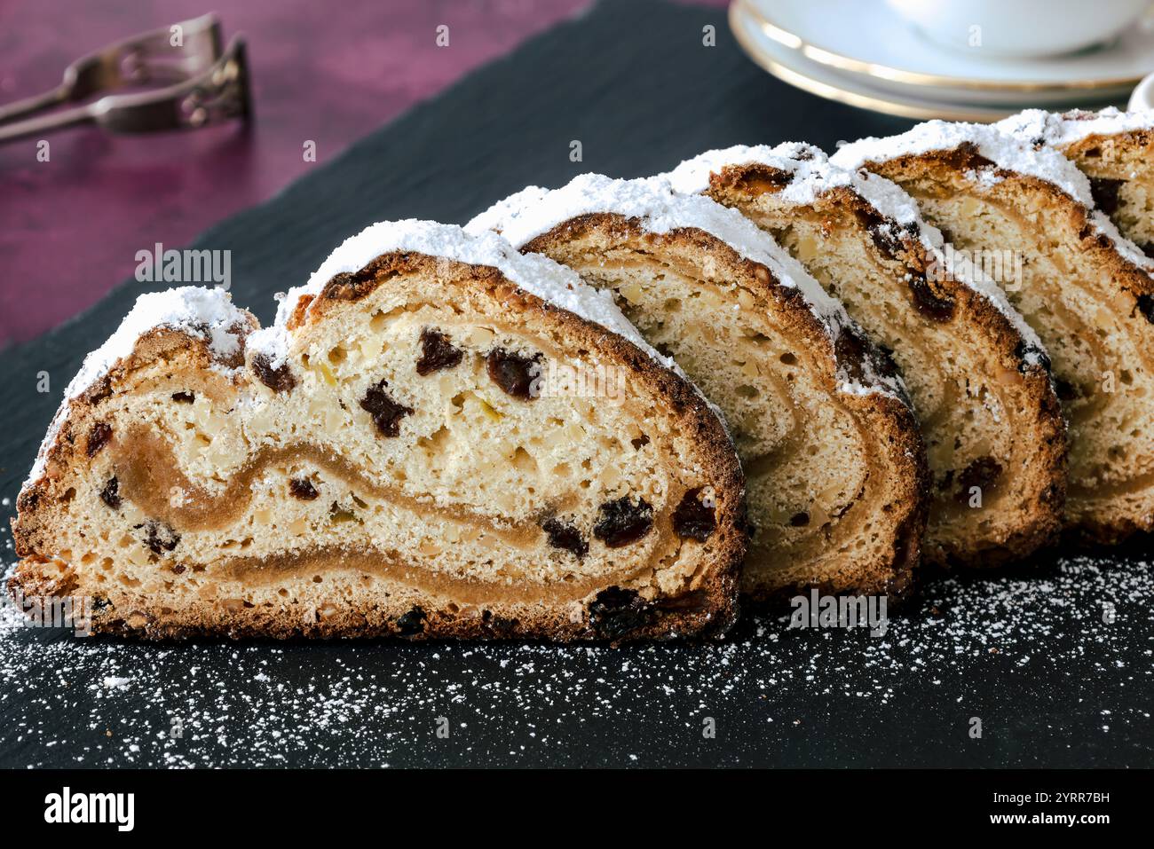 Marzipan stollen with almonds, pistachios and sultanas Stock Photo - Alamy