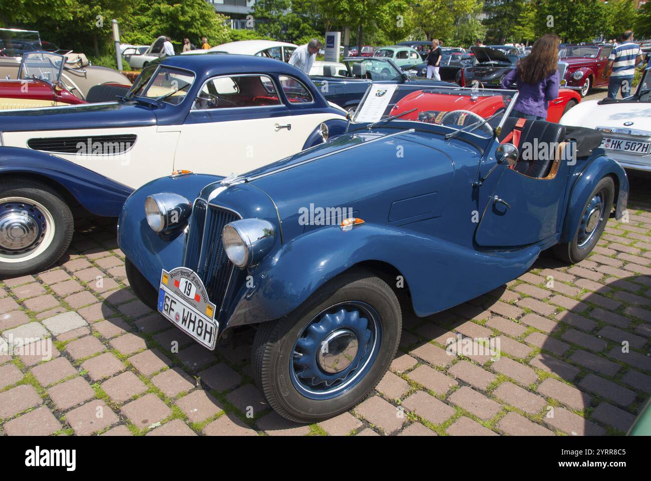 Blue convertible classic car at an open-air car show, convertible ...