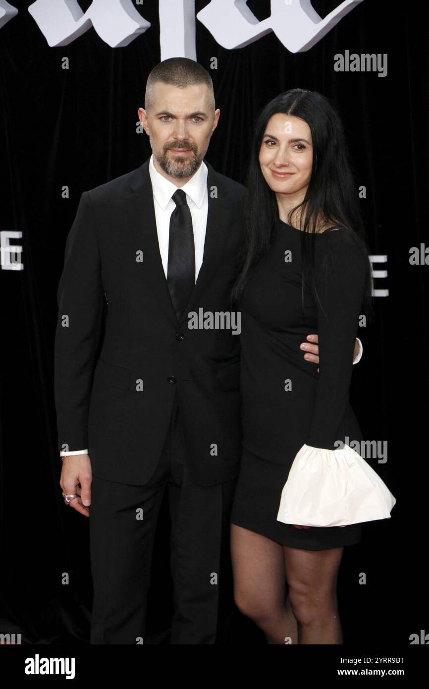Robert Eggers and woman Alexandra Shaker at the premiere of Nosferatu ...
