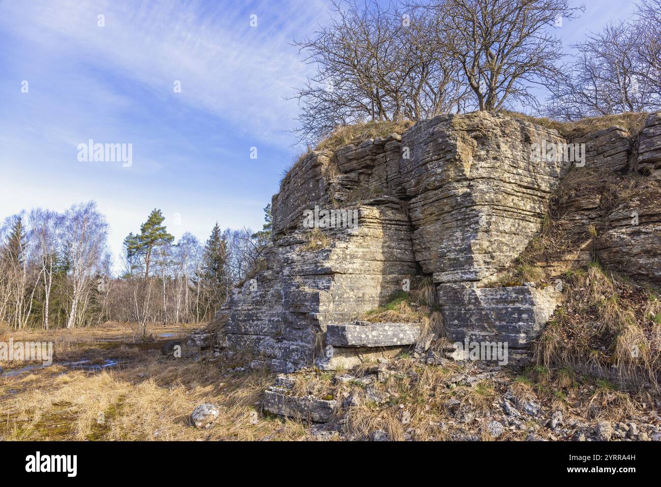 Old abandoned limestone quarry with steep rock walls, Sweden, Europe ...