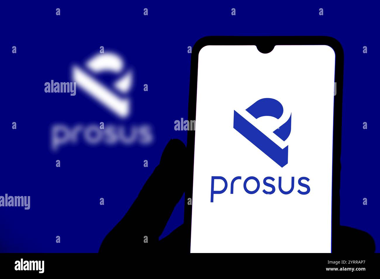 In this photo illustration, the Prosus logo is displayed on a ...