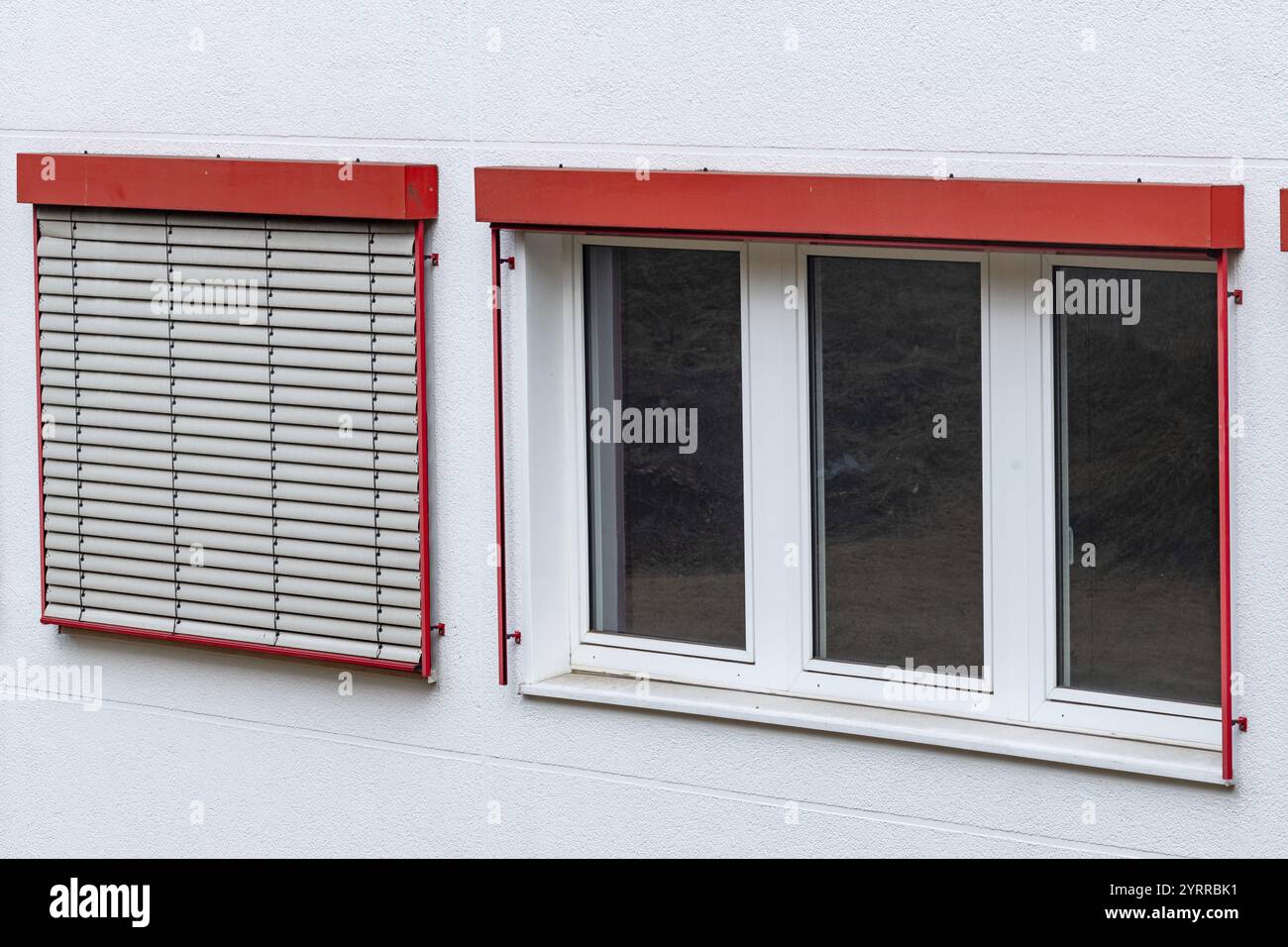 Red and white windows at a modern building Stock Photo - Alamy