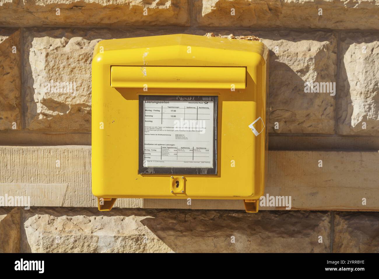Yellow letterbox from Deutsche Post, Germany, Europe Stock Photo - Alamy