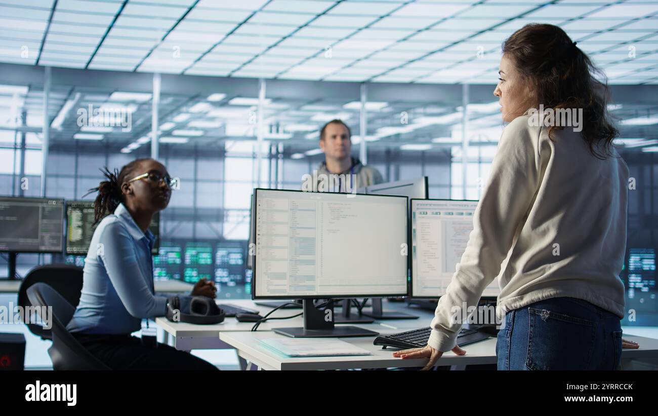 Supervisor overseeing employees hi-res stock photography and images - Alamy