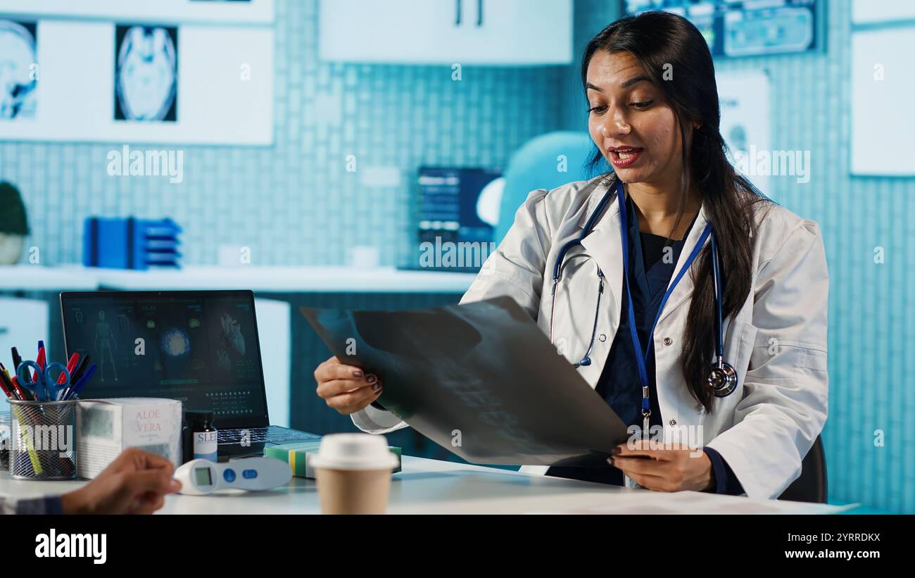 Indian specialist explaining diagnostics hi-res stock photography and ...