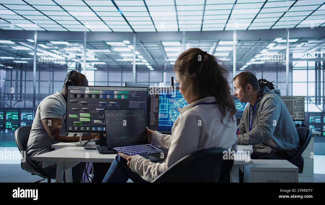 IT employee programming in AI server farm housing advanced equipment ...