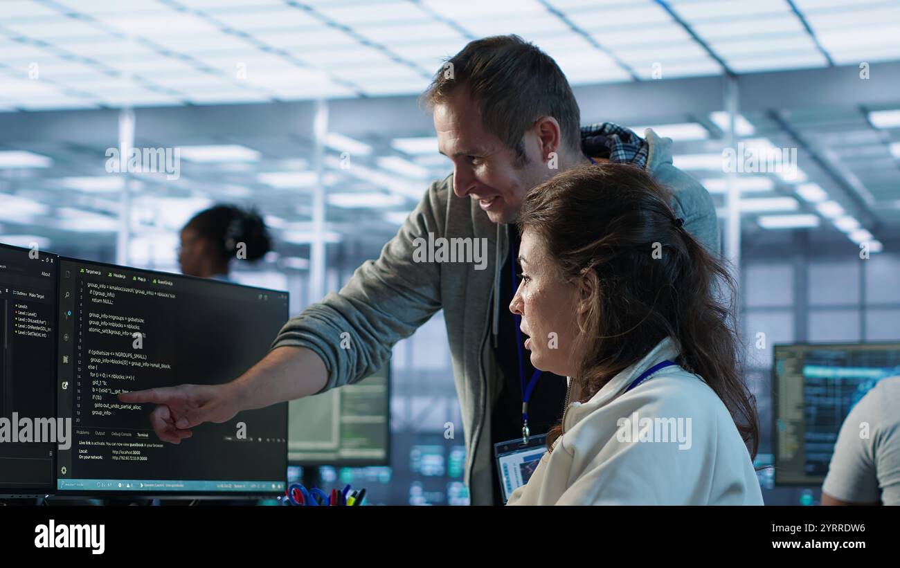 Data center technician discussing coworker hi-res stock photography and images - Alamy