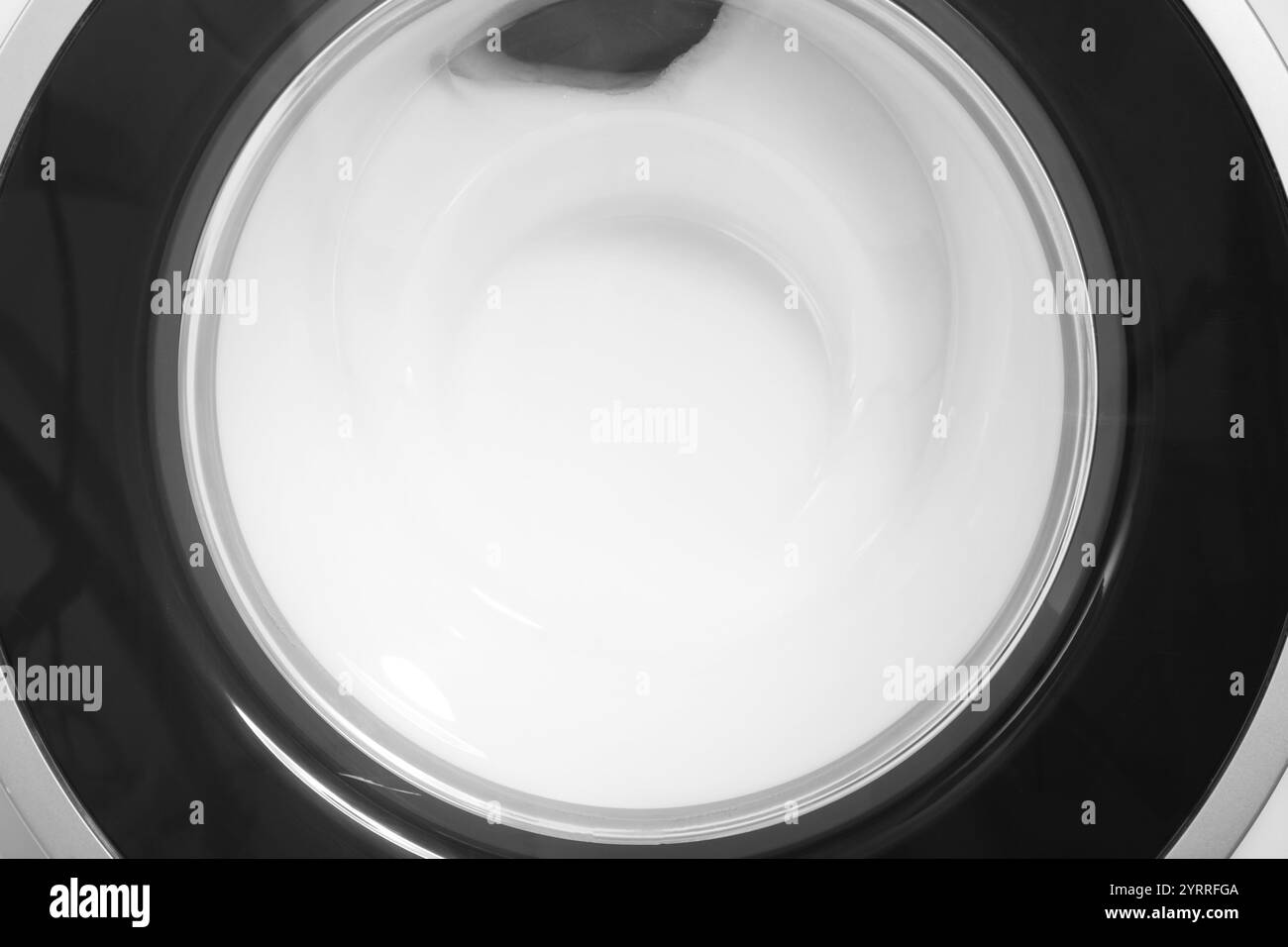 Washing machine with suds as background, closeup Stock Photo - Alamy