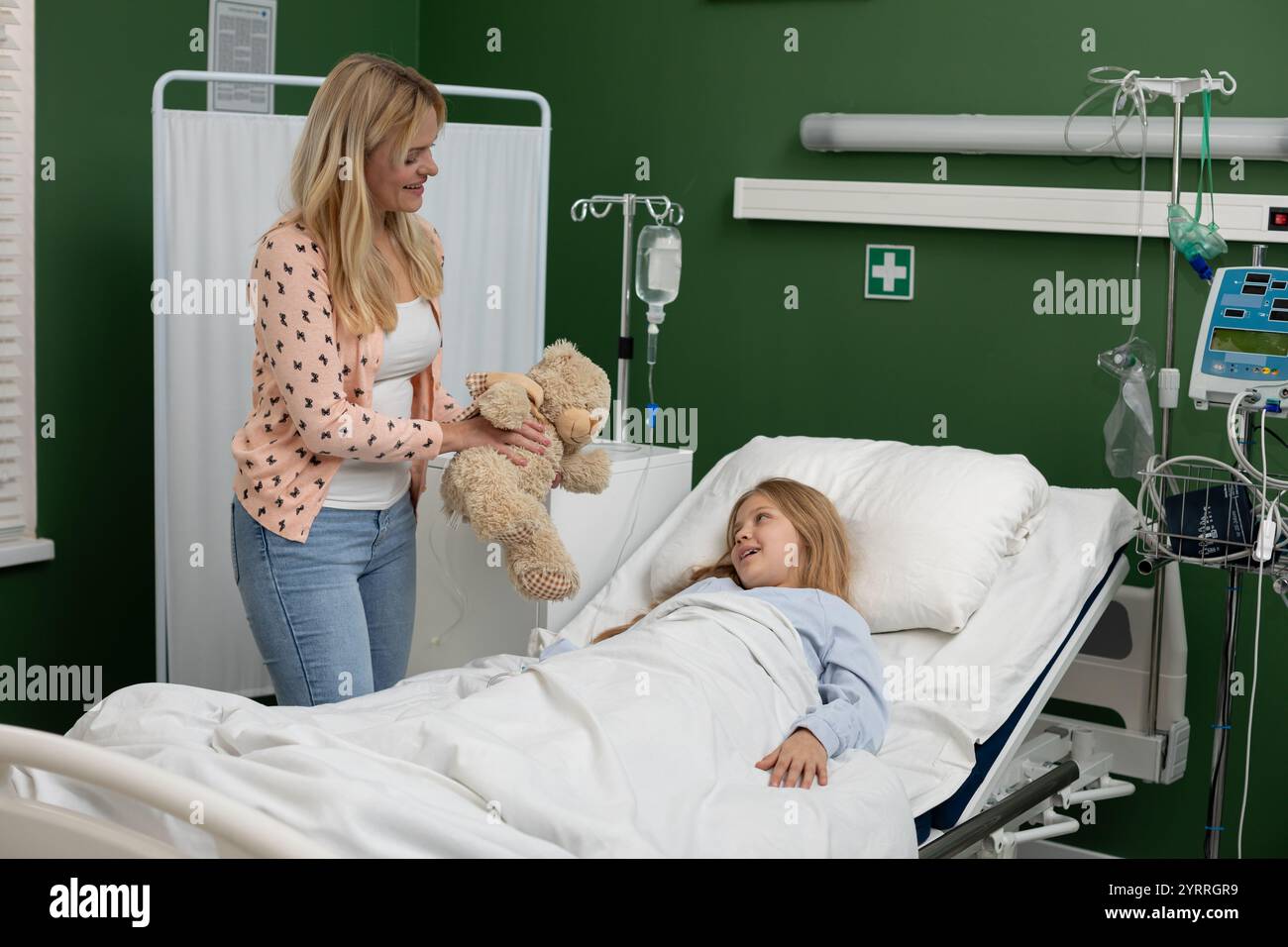A loving mother visits her child who is currently in the hospital ...