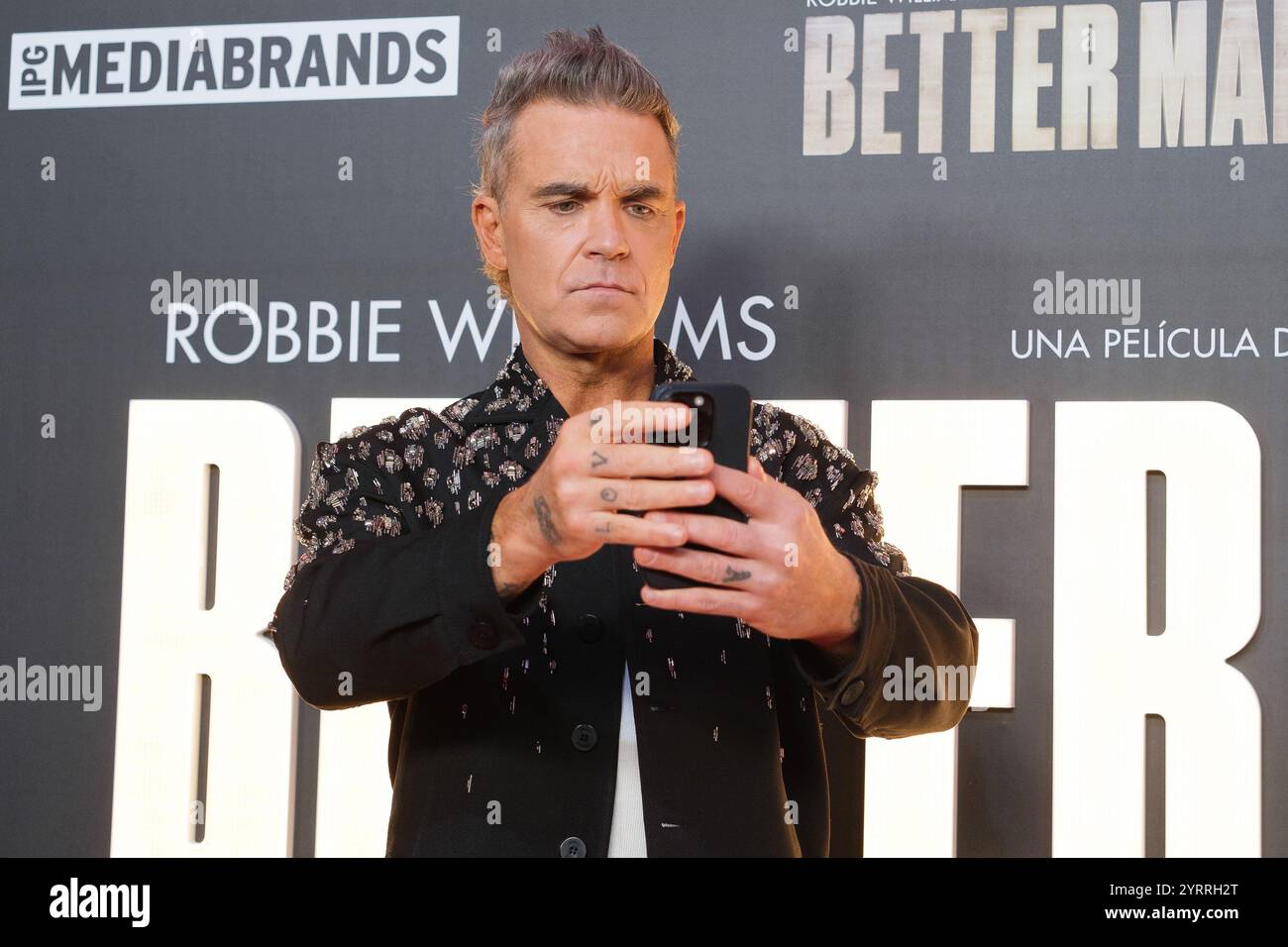 Singer Robbie Williams attends the 'Better Man' premiere at the Capitol ...