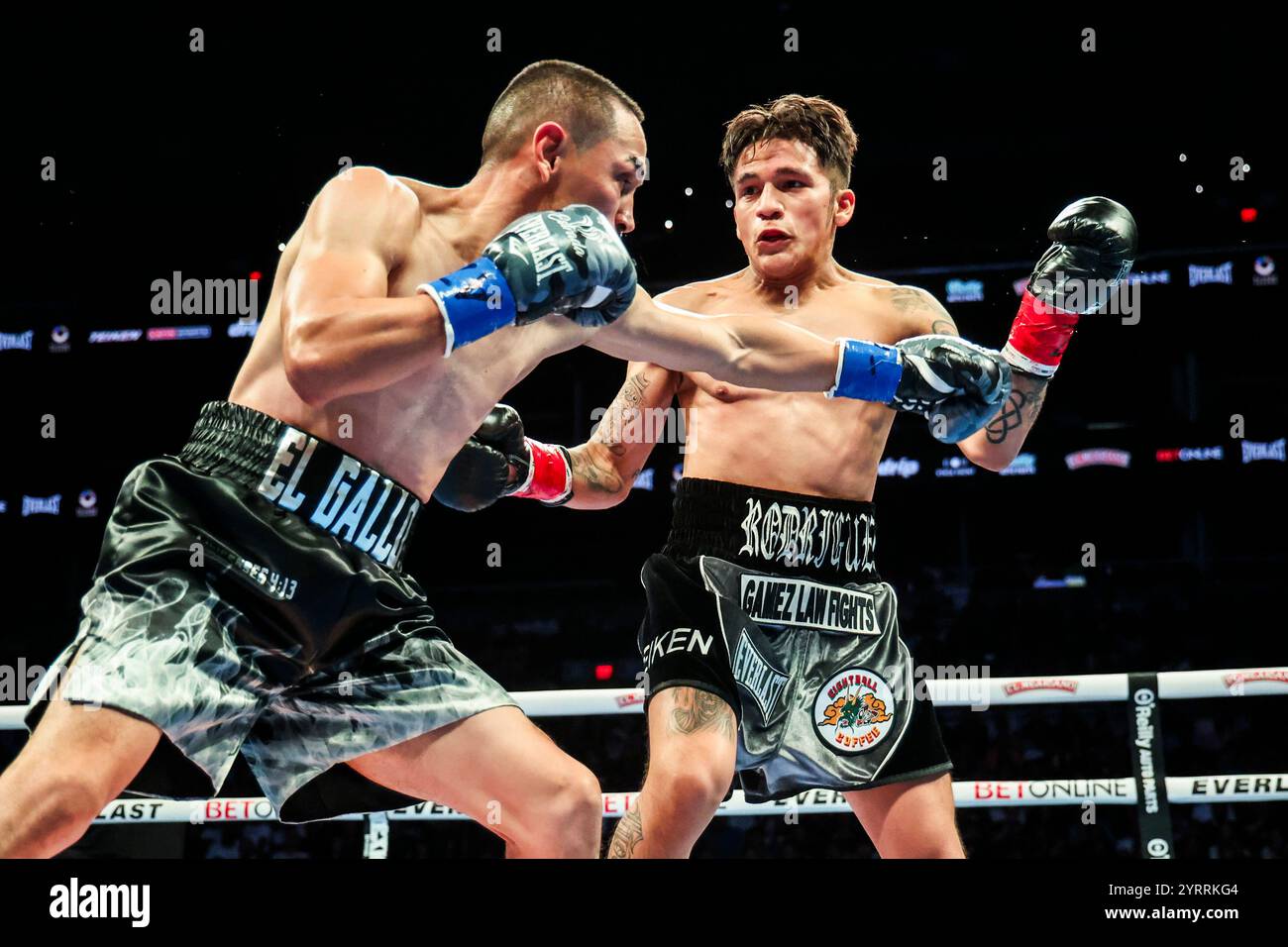 PHOENIX, ARIZONA - JUNE 29: Juan Francisco El 'Gallo' Estrada (L) and ...