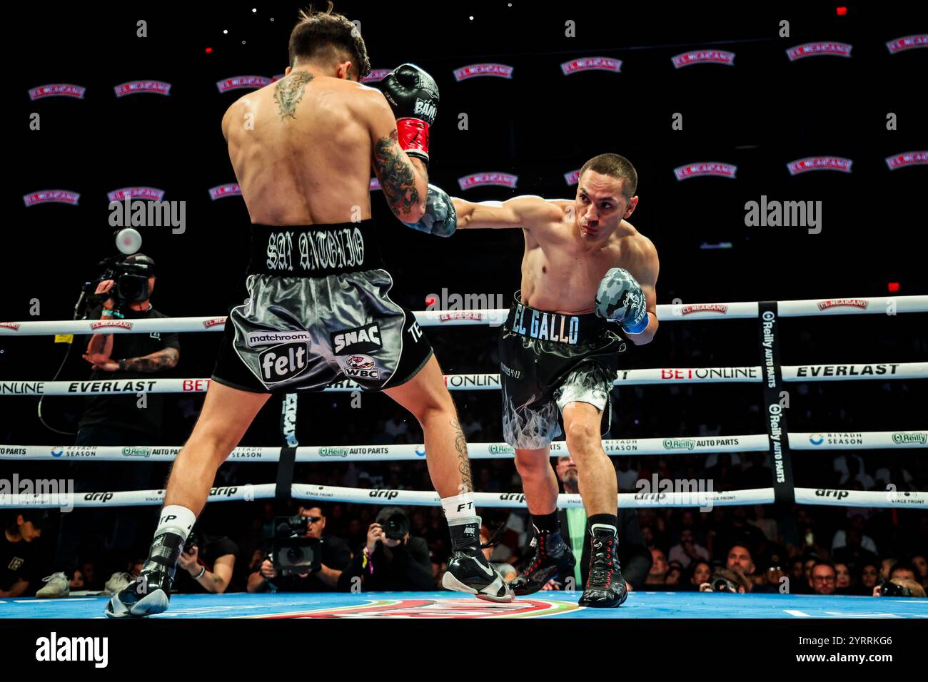 PHOENIX, ARIZONA - JUNE 29: Juan Francisco El 'Gallo' Estrada (R) and ...