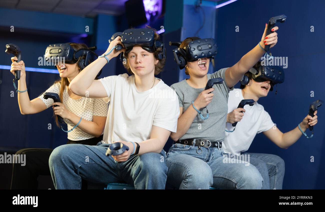 Young people having fun with new technology of vr headset goggles Stock ...