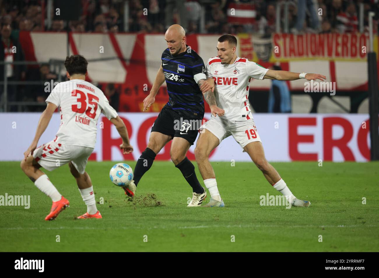 From left: Max Finkgraefe (Cologne), Toni Leistner (Hertha) and Tim ...