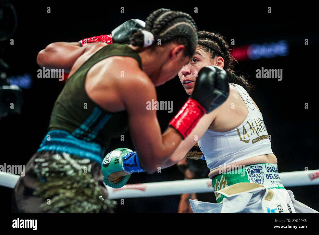 PHOENIX, ARIZONA - JUNE 29: Yamileth Mercado and Ramla Ali fight during their fight for Mercado ...