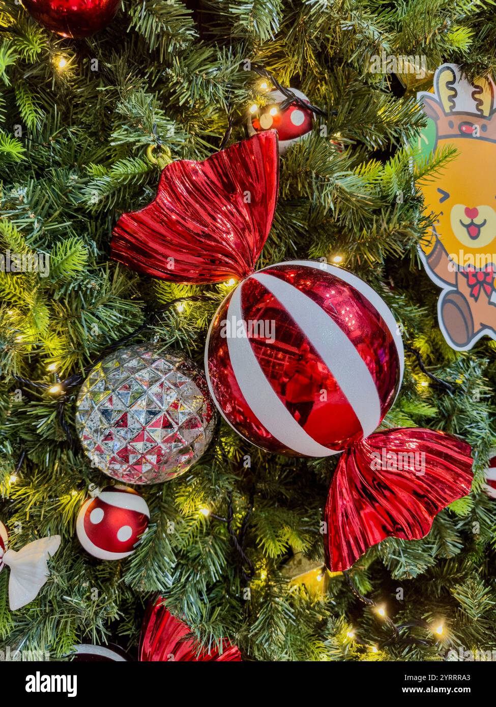 Red themed christmas tree decorations Stock Photo - Alamy