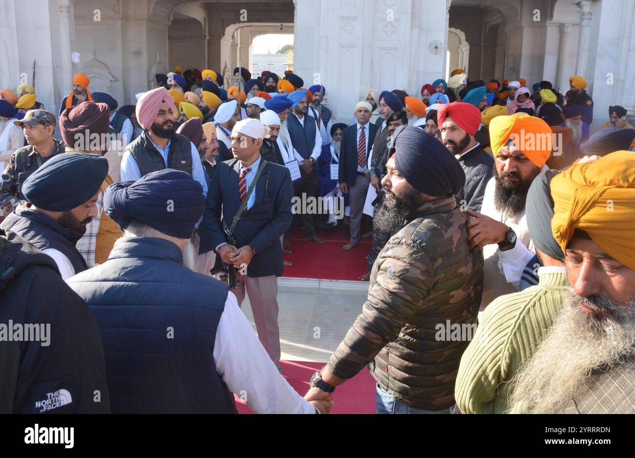 AMRITSAR, INDIA - DECEMBER 4: SAD leader Sukhbir Singh Badal performing duty of sewadar in a ...