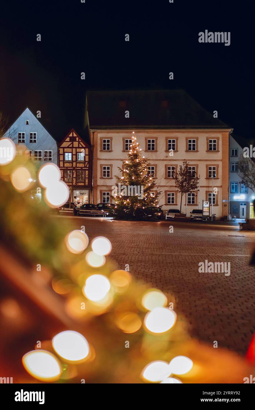 Christmas tree glows in the town square . Christmas Tree and Lights in ...