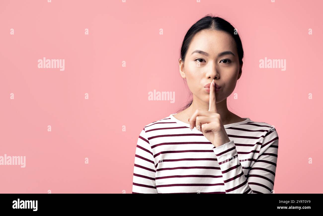 Keep Silence. Mysterious Young Asian Woman Showing Shh Gesture At ...
