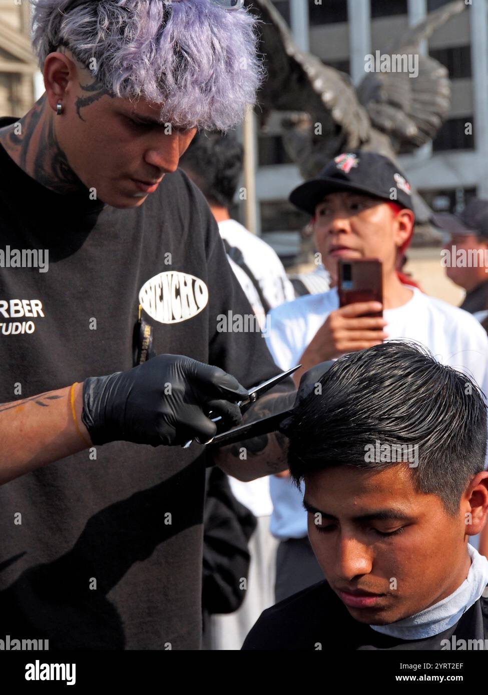 Lima, Peru. 04th Dec, 2024. Barbers give free haircut demonstrations ...