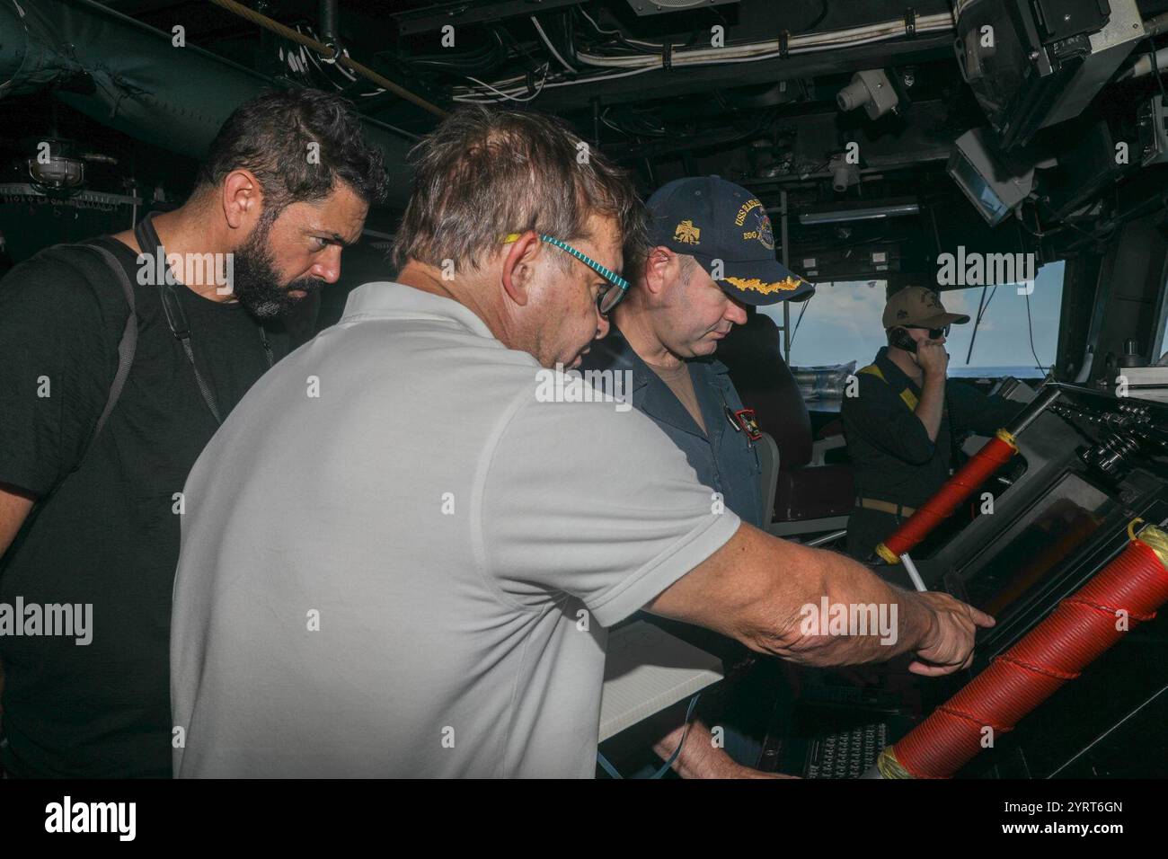 Charles Cooper, Balazs Gardi, Dexter Filkins, on the USS Rafael Peralta ...