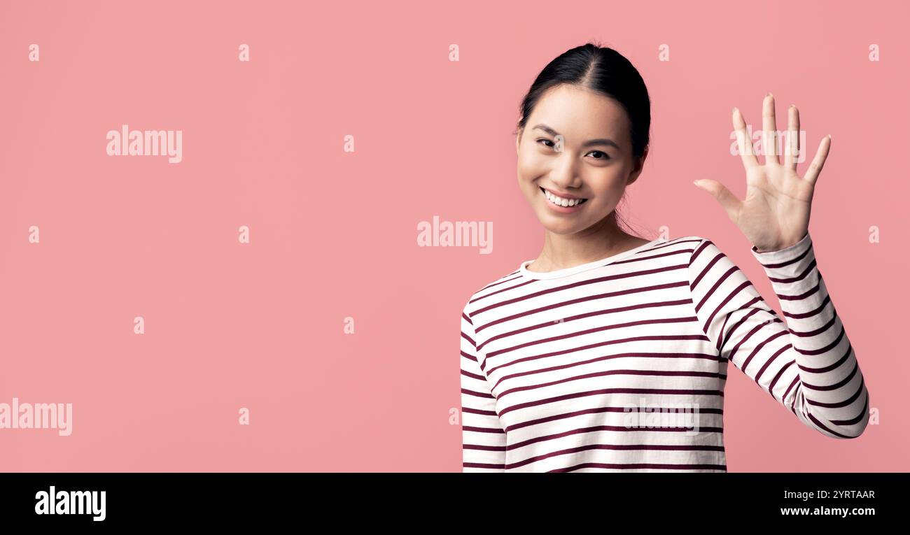 Hello. Portrait Of Friendly Beautiful Asian Woman Waving Hand At Camera ...
