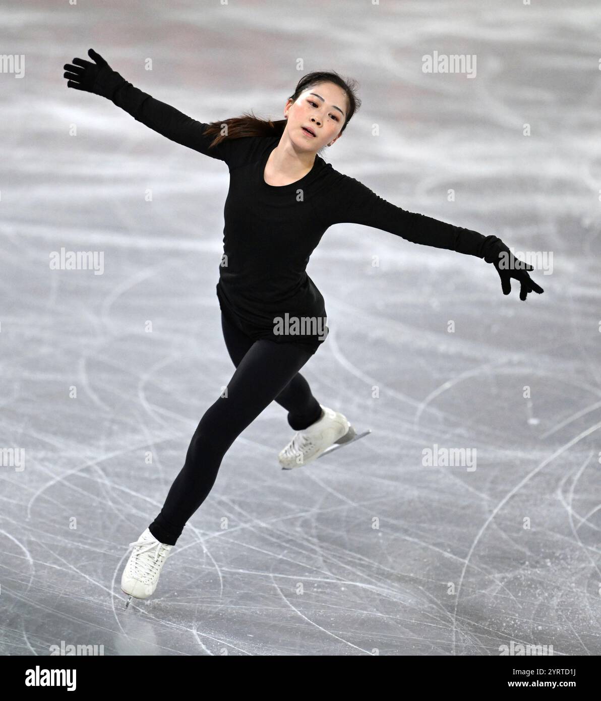 Japanese figure skater Hana Yoshida practices for the ISU Grand Prix Final in Grenoble, France ...
