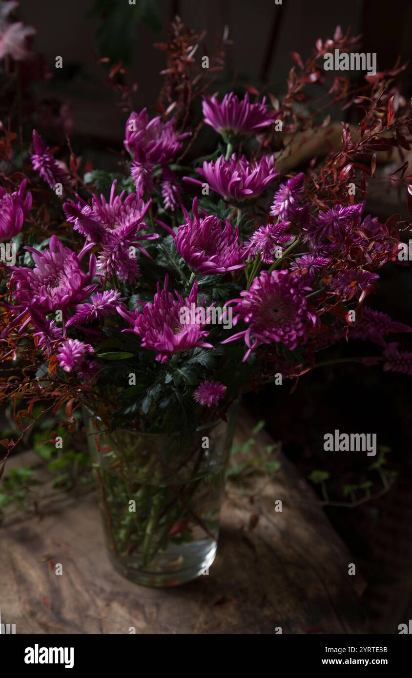 Purple flower arrangement Stock Photo - Alamy