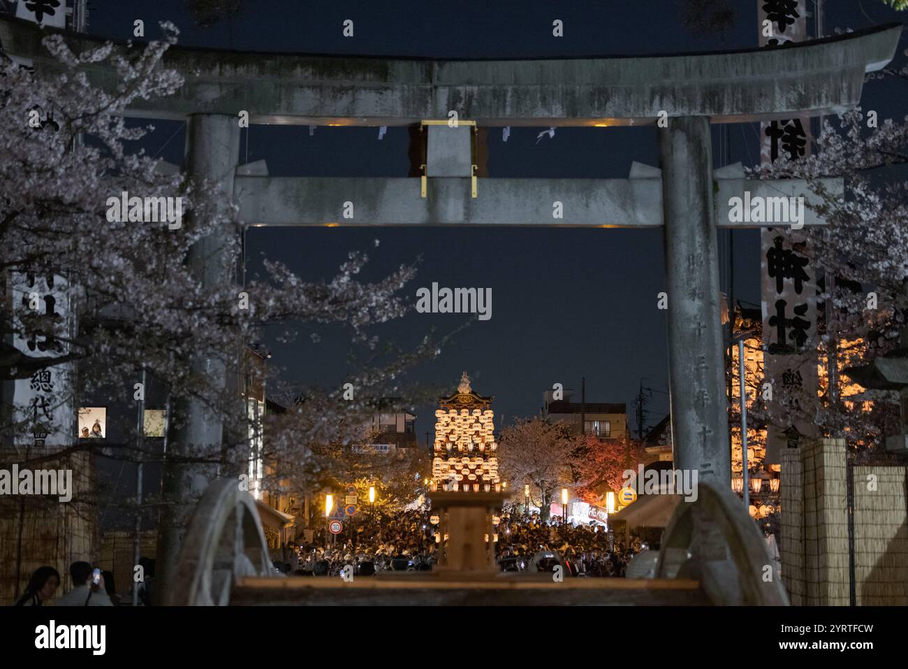 Night floats at the Shingaku Festival from the large torii gate of ...