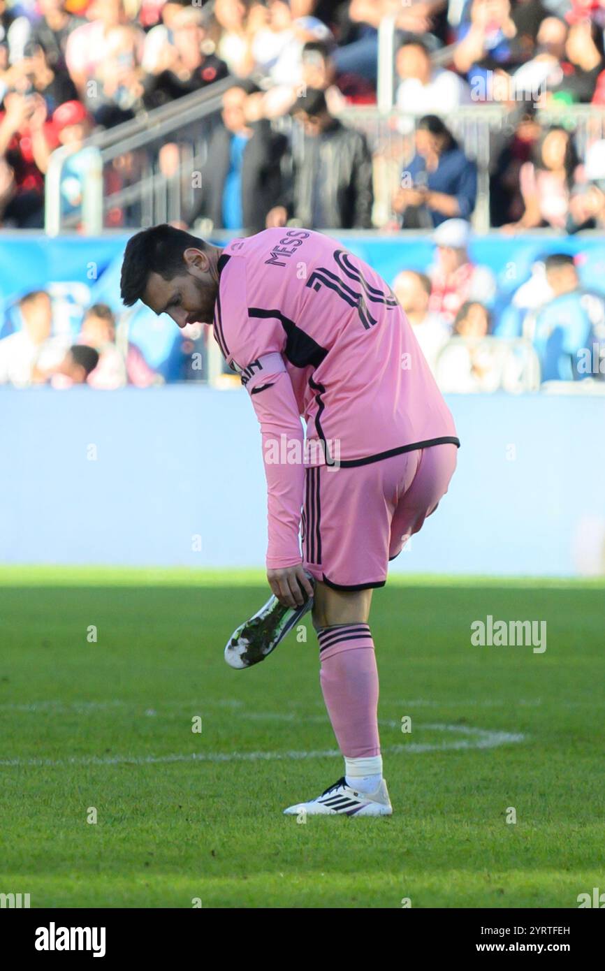 Toronto, ON, Canada - October 5, 2024: Lionel Messi #10 of the Inter Miami FC cleans mud from ...
