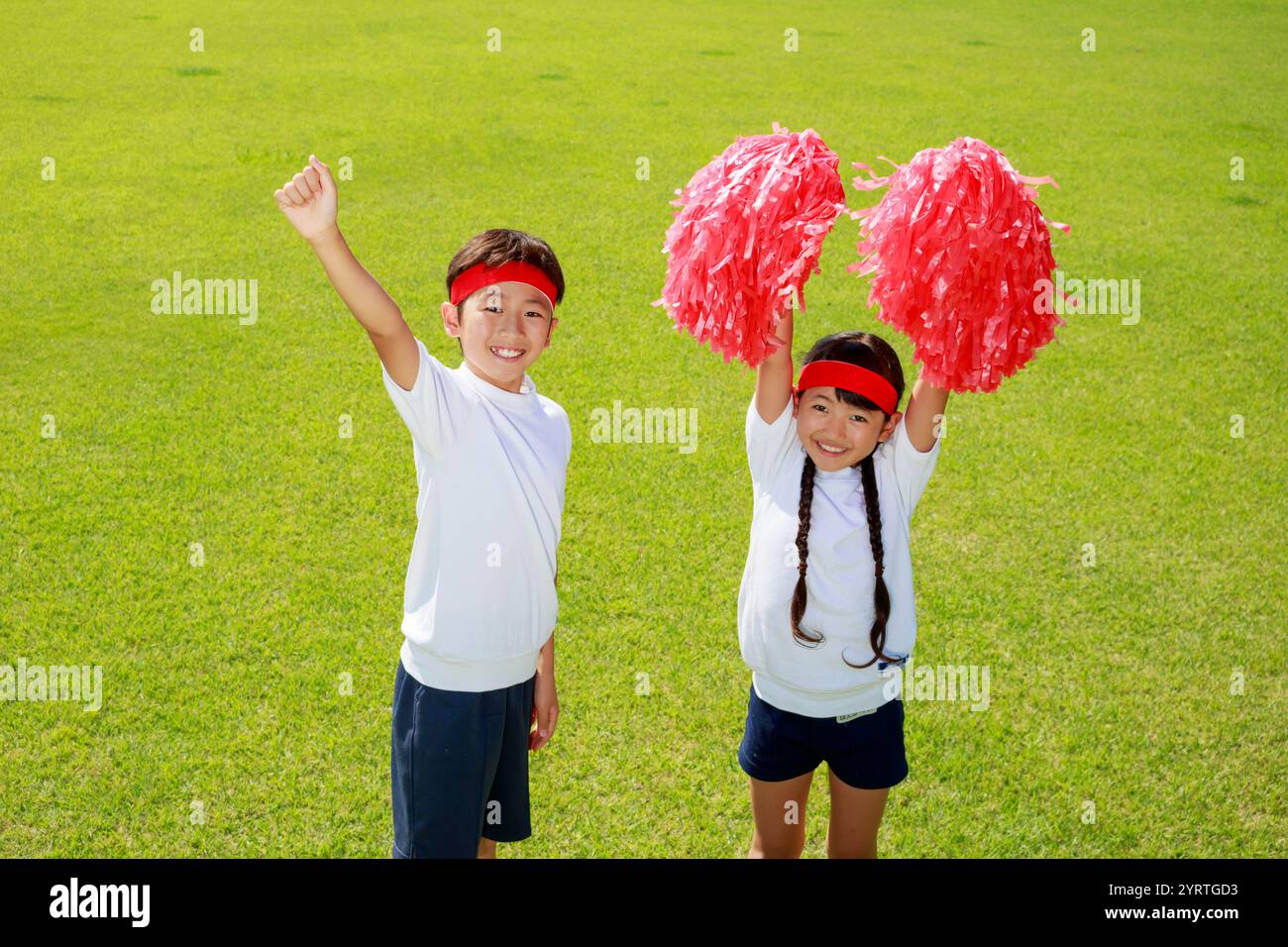 Children cheering in gym clothes Stock Photo - Alamy