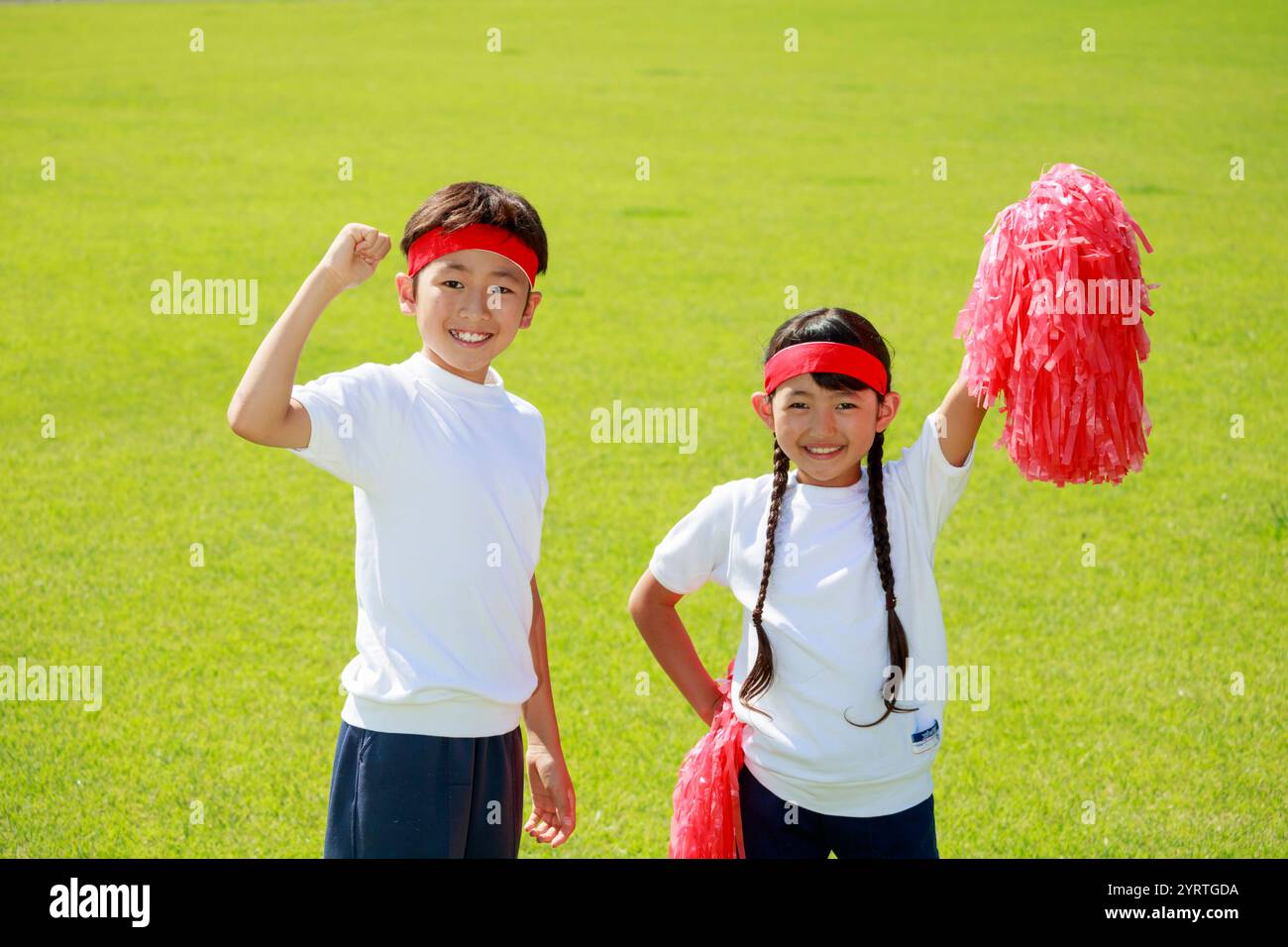 Children cheering in gym clothes Stock Photo - Alamy